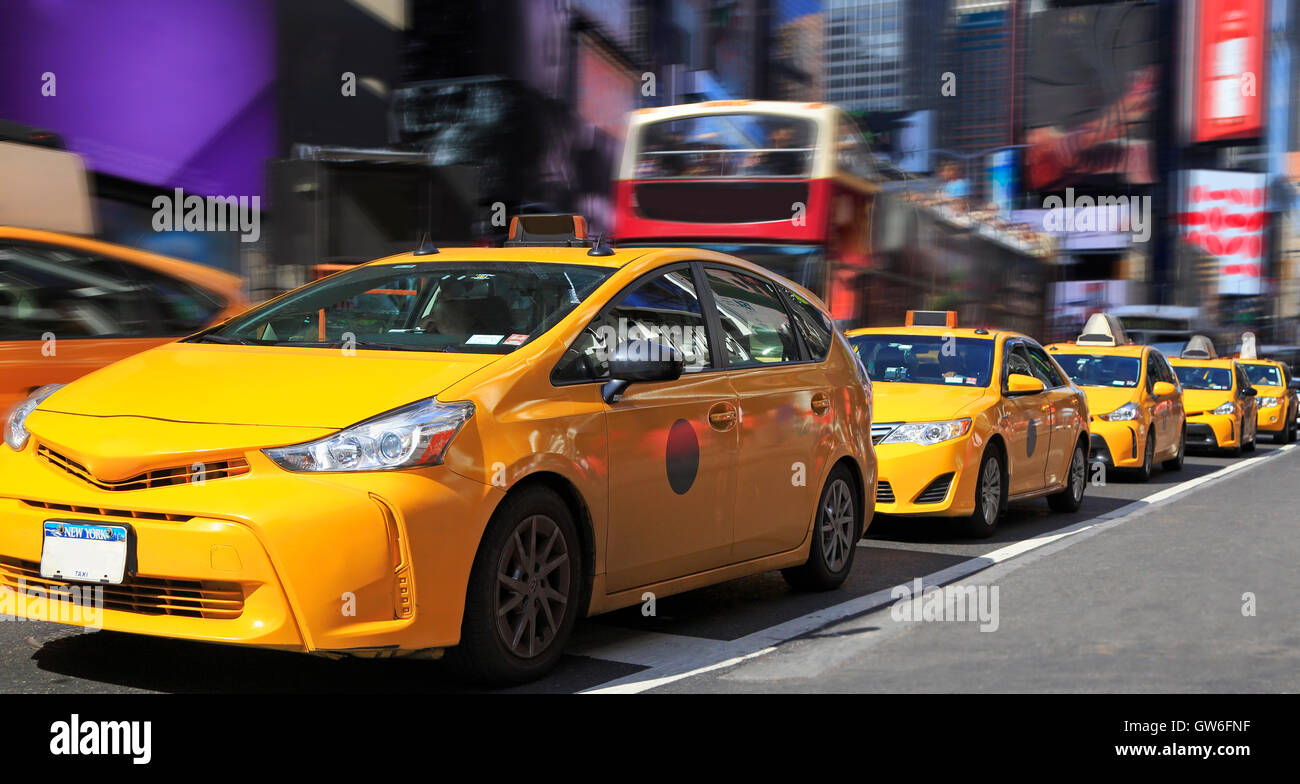 Yellow Taxis in Times Square is a major commercial intersection and ...