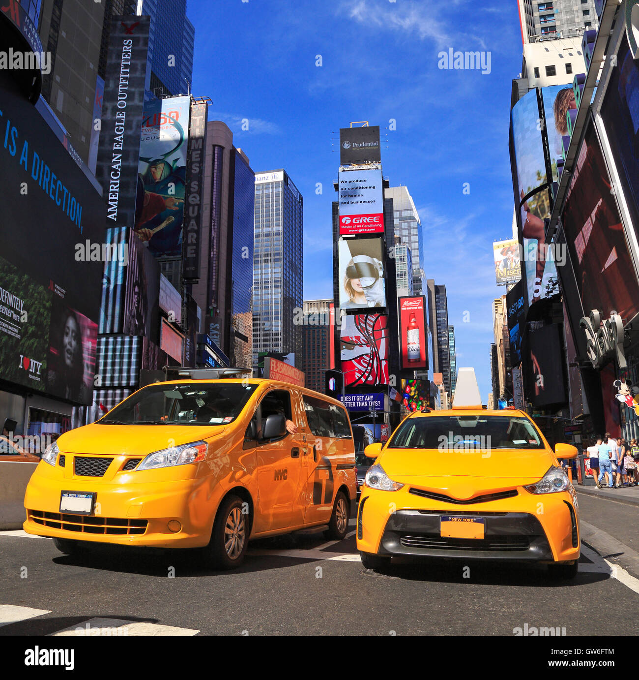 Yellow Taxis in Times Square is a major commercial intersection and ...