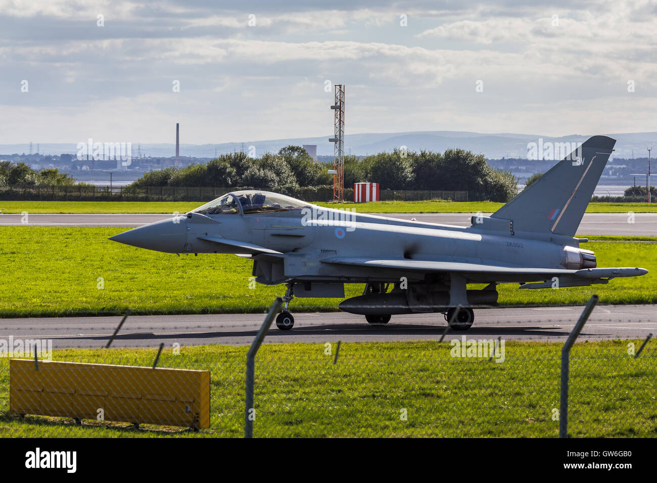 Mark Long, the 2016 Typhoon Display pilot waves to the crowd at ...