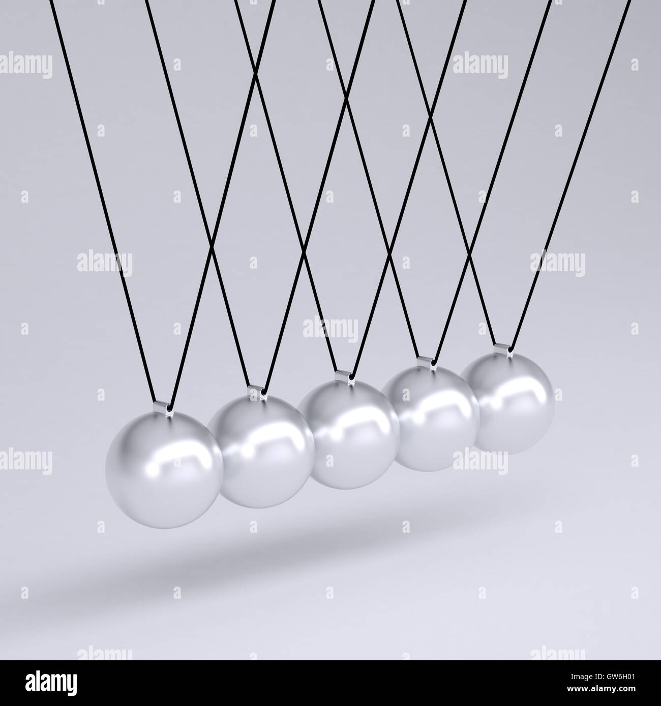 Close up of Newton's cradle Stock Photo - Alamy