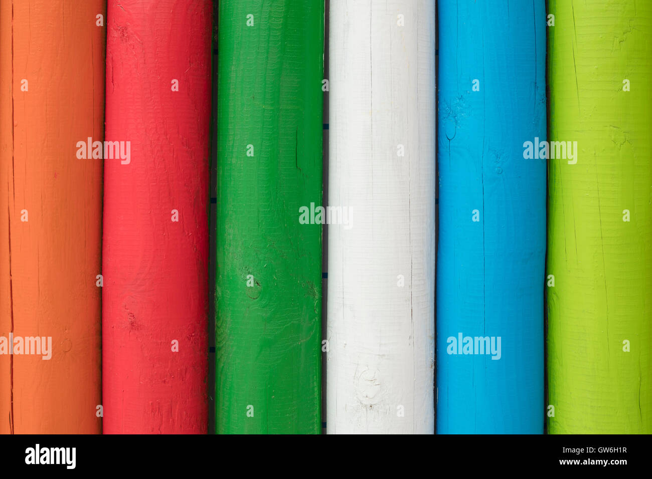 Detail of colorful wooden poles Stock Photo - Alamy