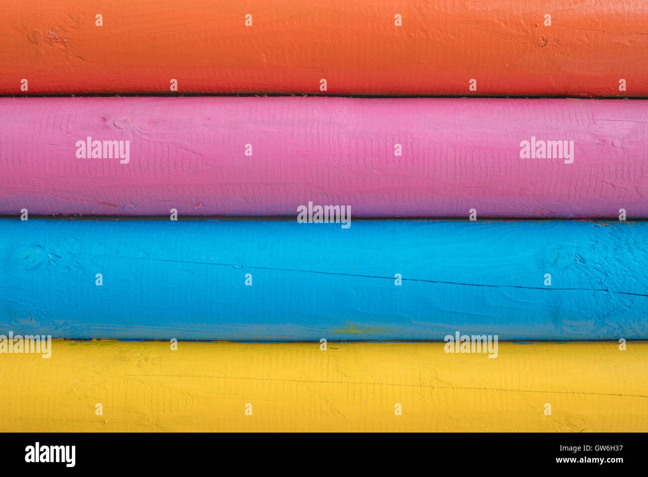 Detail of colorful wooden poles Stock Photo - Alamy