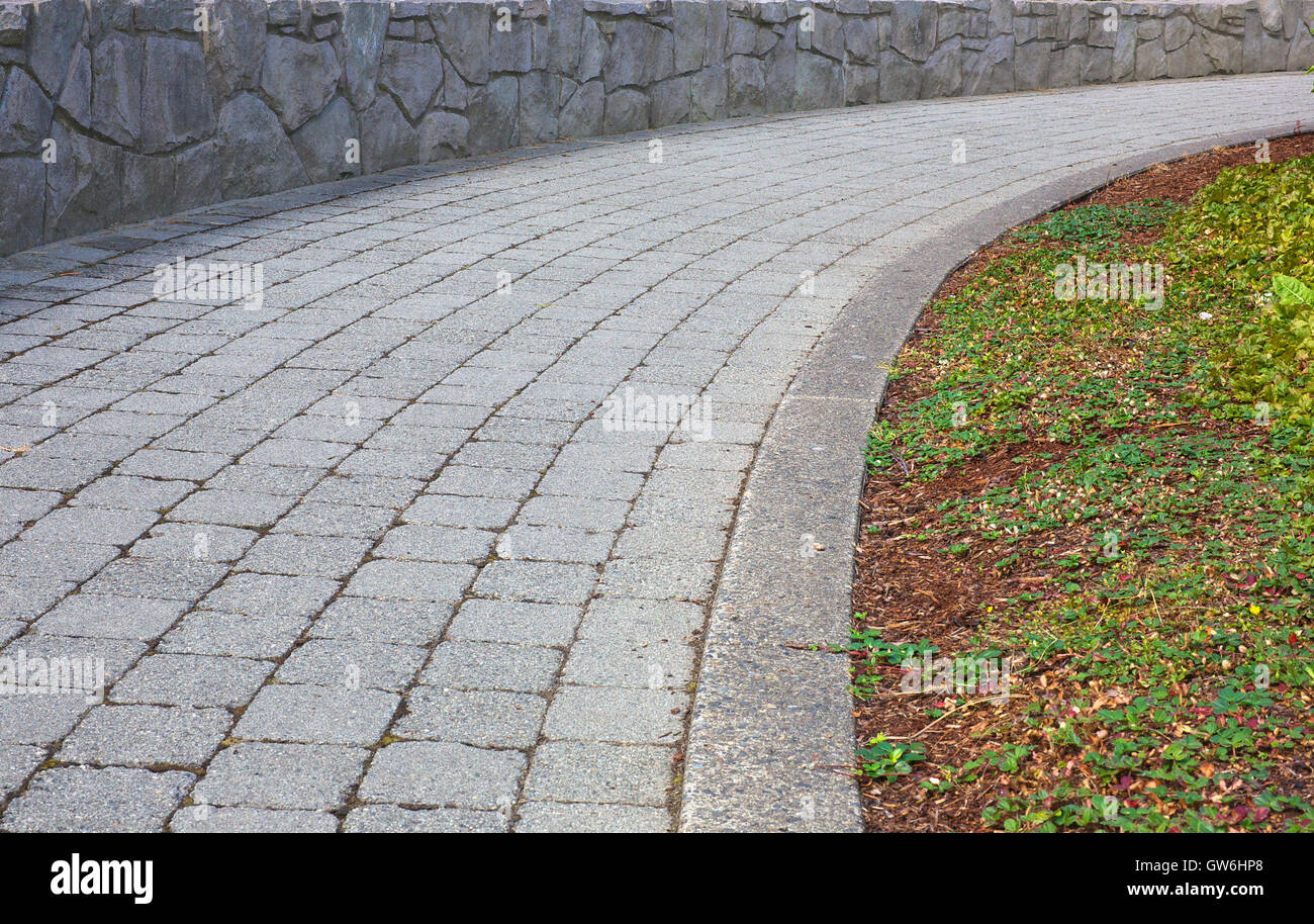 Curved stone path Stock Photo - Alamy