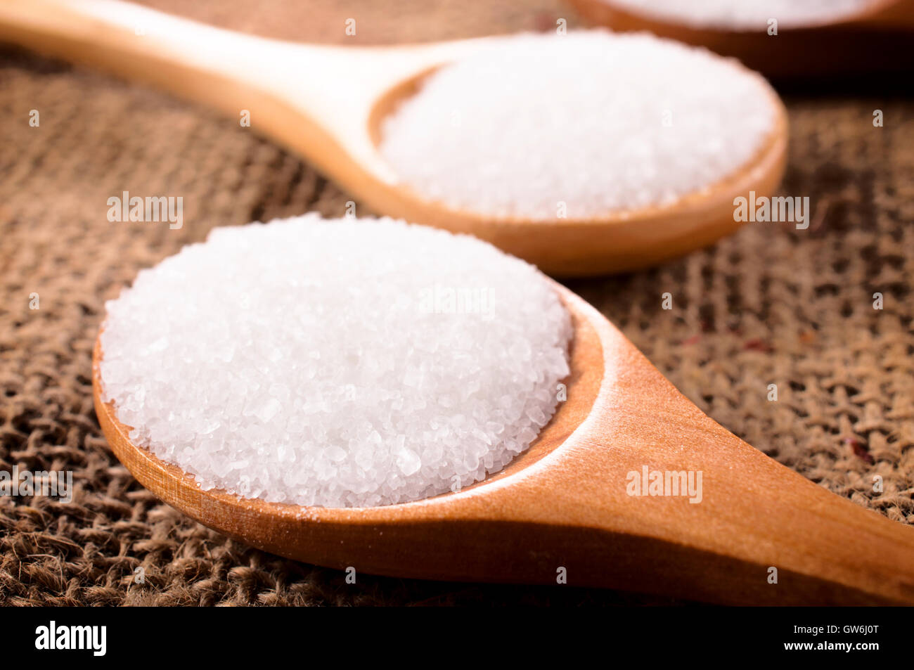 Salt in spoon Stock Photo - Alamy