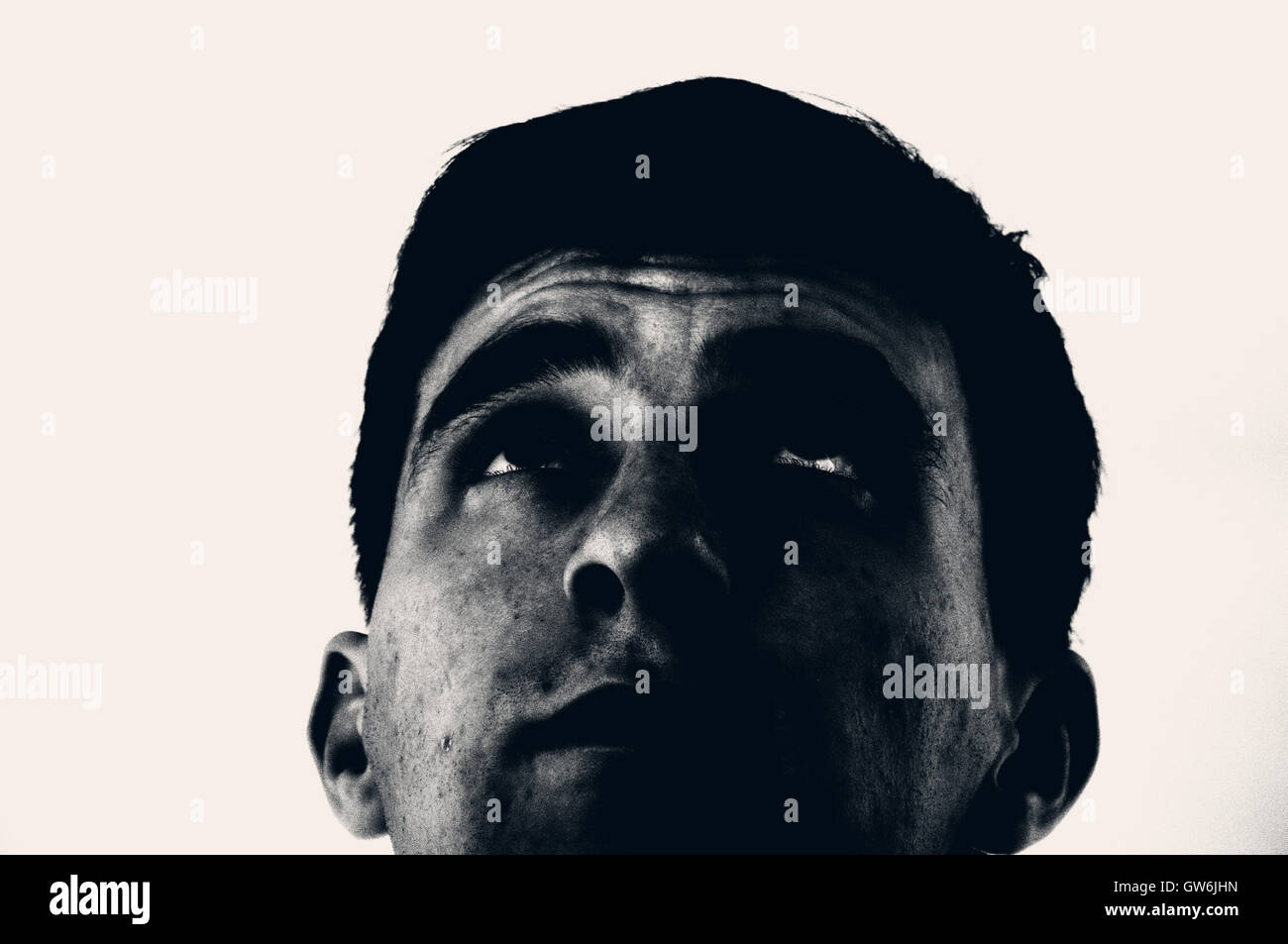 Man staring up Stock Photo - Alamy