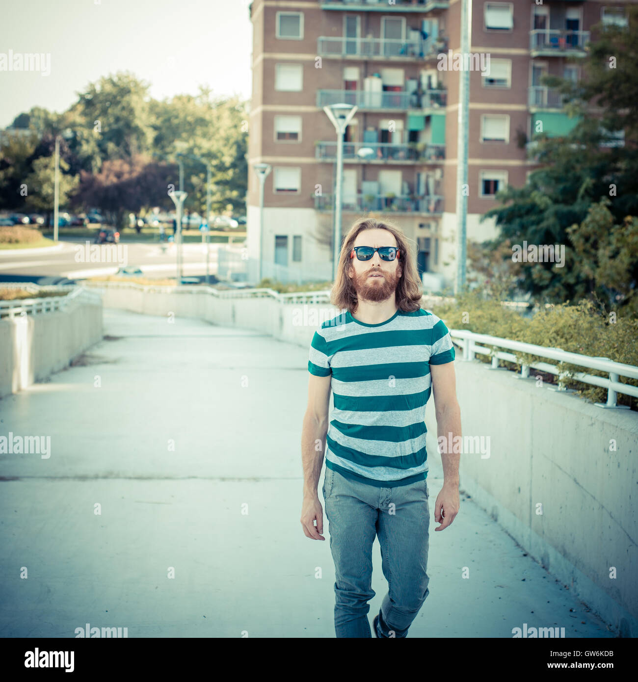 stylish hipster model with long red hair and beard lifestyle Stock ...