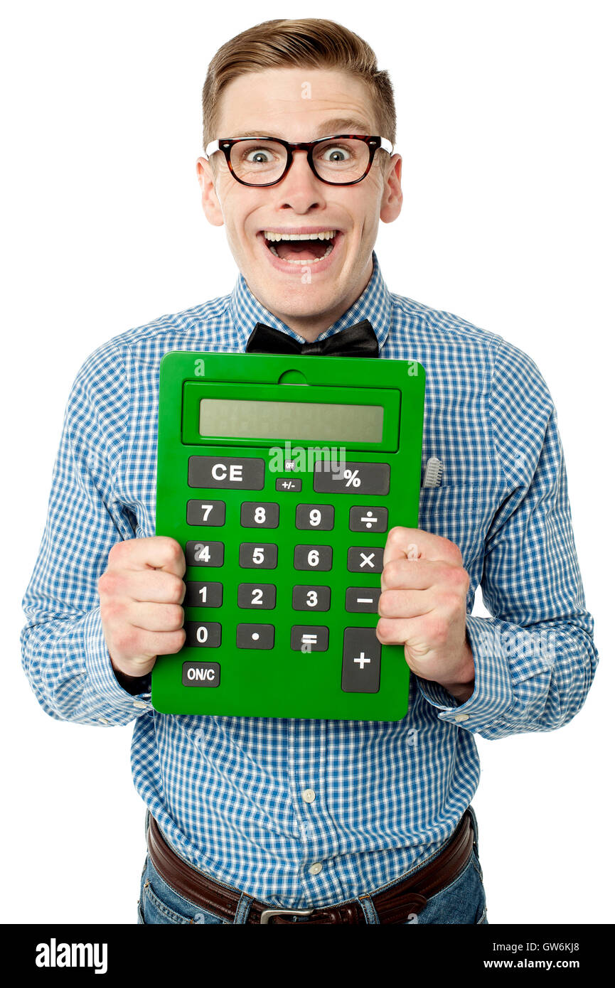 Shocked man holding calculator hi-res stock photography and images - Alamy