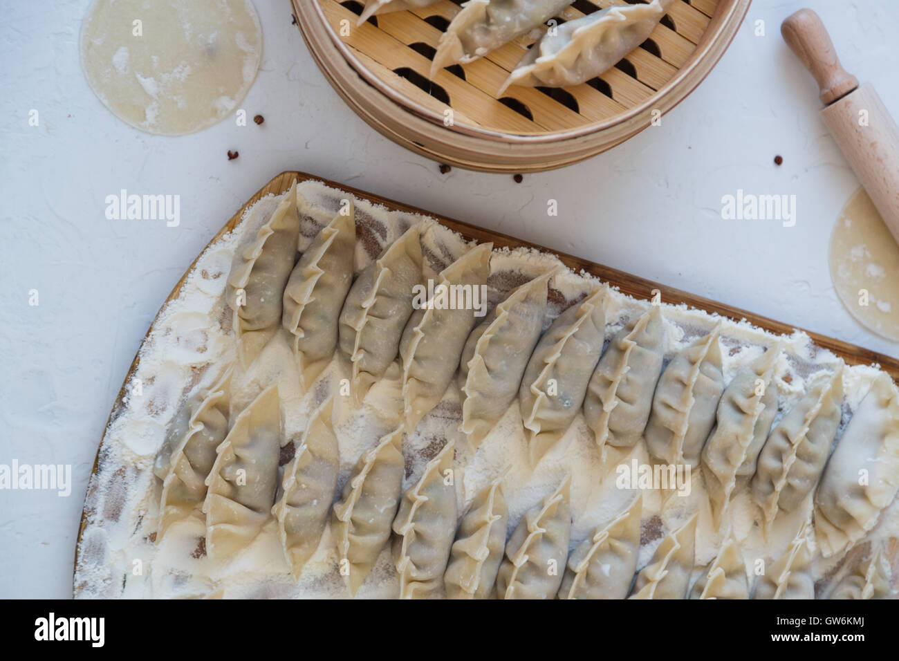 raw dumplings on the wooden desk, top view Stock Photo - Alamy