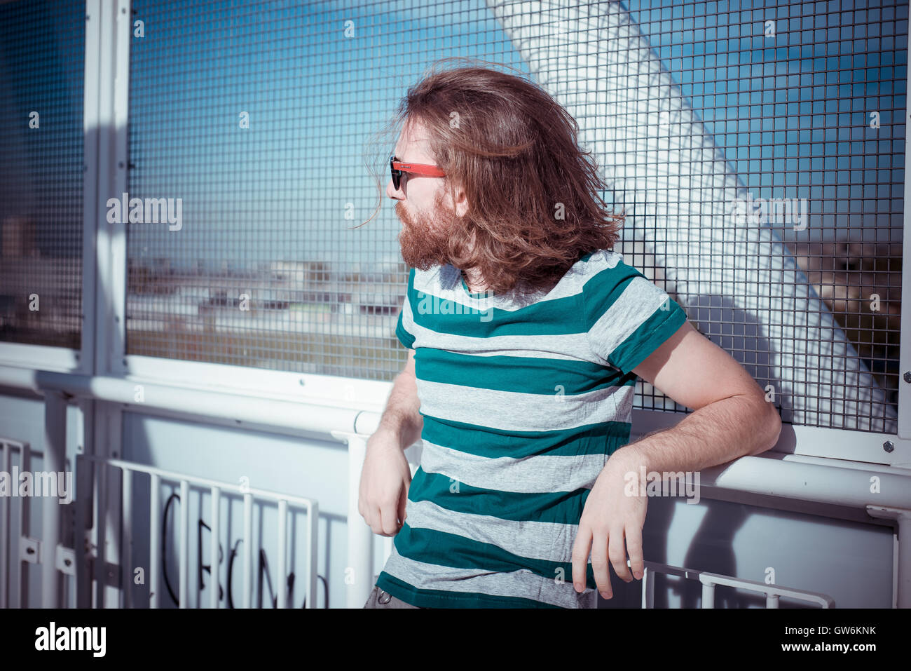 stylish hipster model with long red hair and beard lifestyle Stock ...