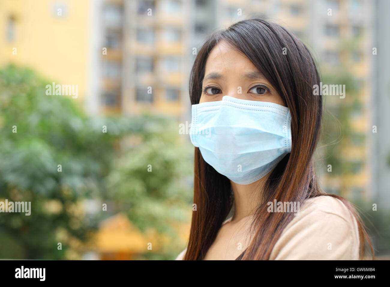 Asian woman wear face mask Stock Photo - Alamy