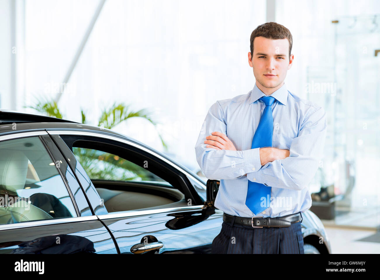 Man car salesman stands hi-res stock photography and images - Alamy