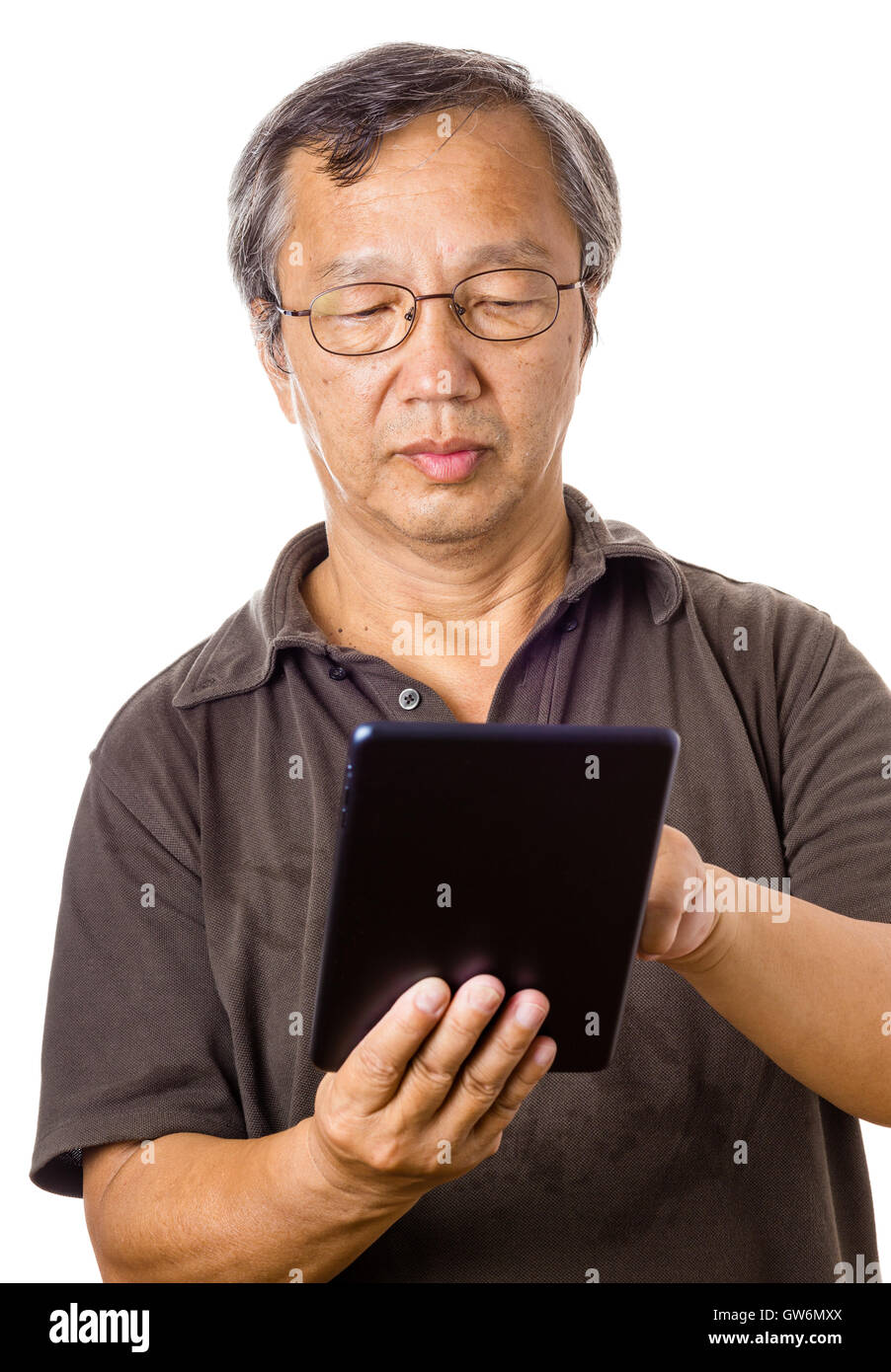 Asian old man using tablet Stock Photo - Alamy