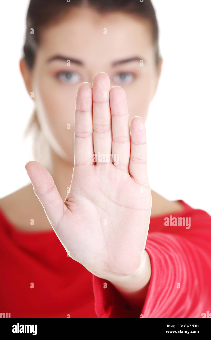 Confident woman making stop gesture sing Stock Photo - Alamy