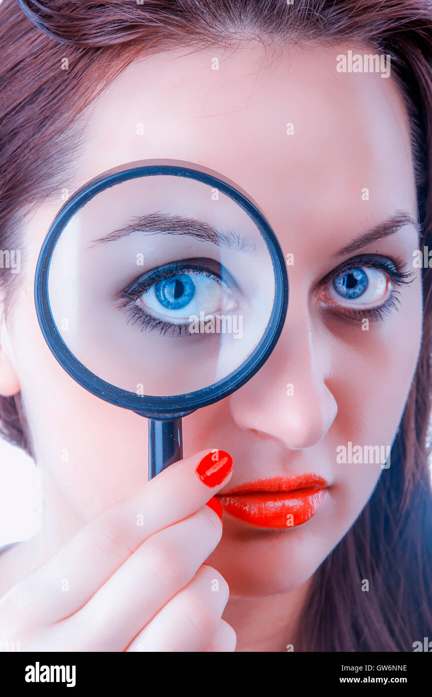 Women with magnifying glass Stock Photo - Alamy