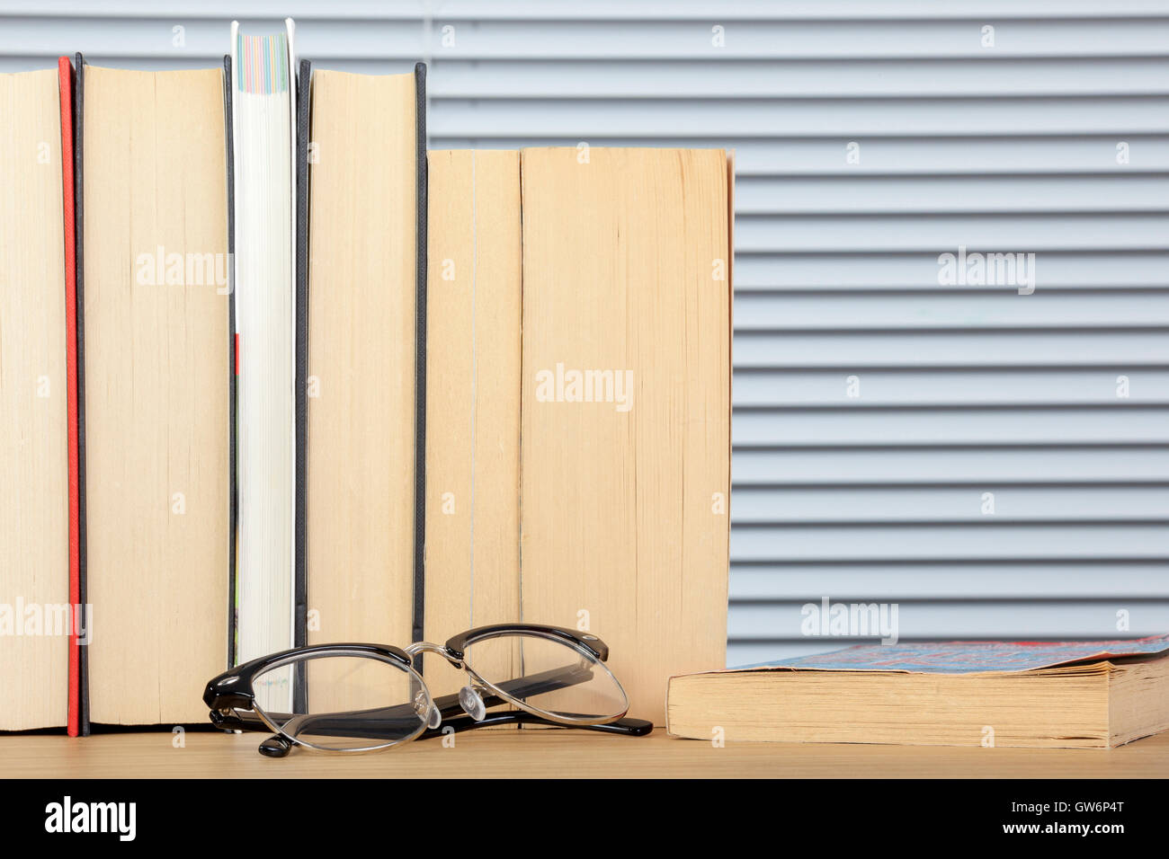 Old looking books in pile hi-res stock photography and images - Alamy