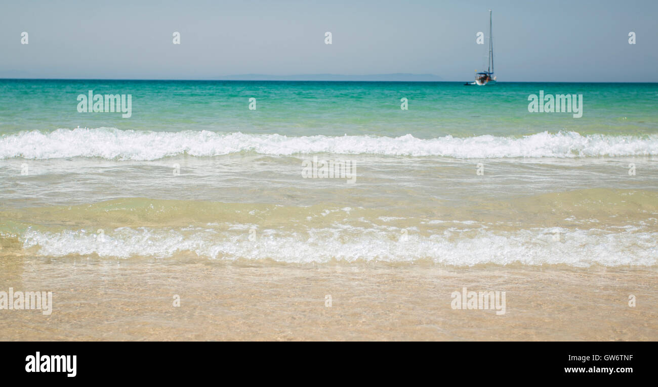 Turquoise beautiful beach in a sunny day Stock Photo - Alamy