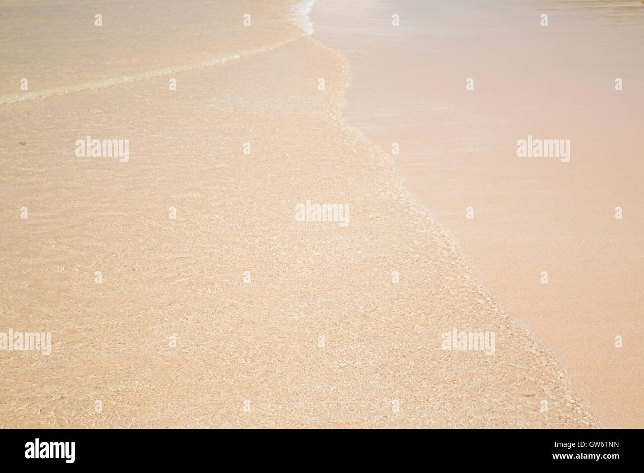 Golden brown sand of beach texture background Stock Photo - Alamy