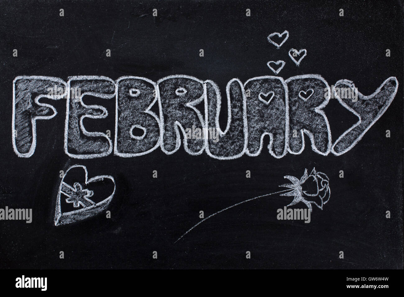 Handwritten February with Valentine days symbols, rose, hearts and ...