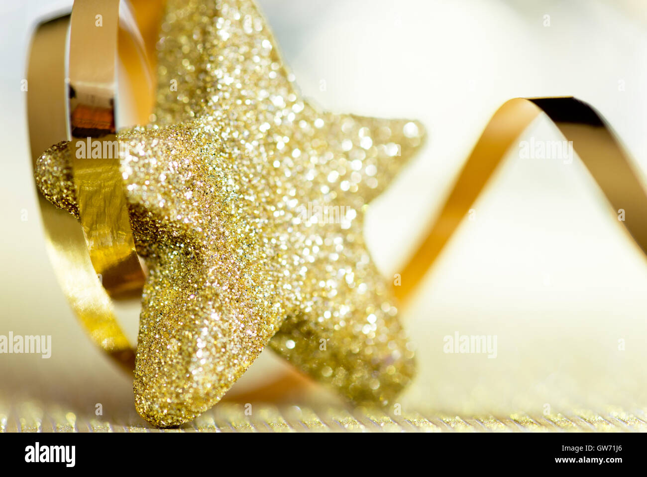 Christmas star with a ribbon Stock Photo - Alamy