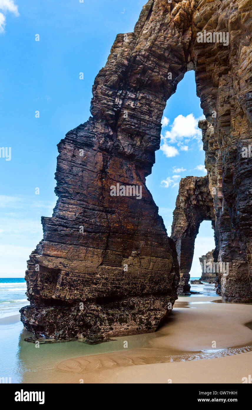 Natural rock arches on Cathedrals beach in low tide (Cantabric coast ...
