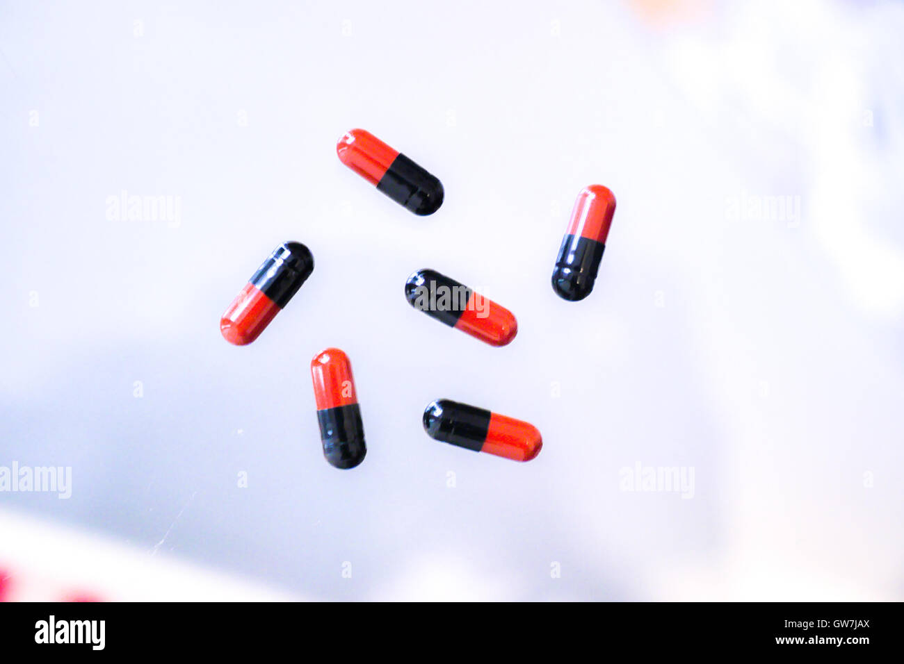 Medicine pills or capsules in hand, palm or fingers. Drug prescription ...