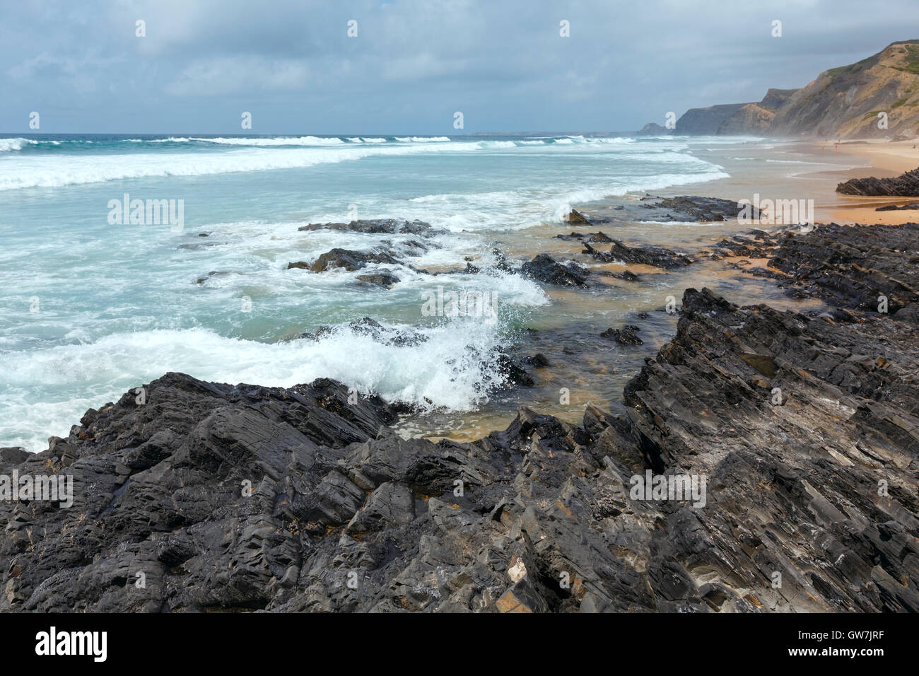Storm on Castelejo beach with black schist cliffs (Algarve, Portugal ...