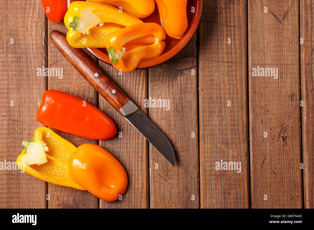 Small bell peppers in red and orange Stock Photo - Alamy