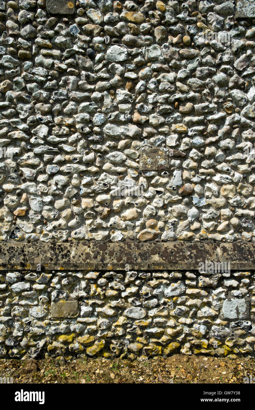 Decorative flint built wall on Cranbourne village church, Dorset, UK ...