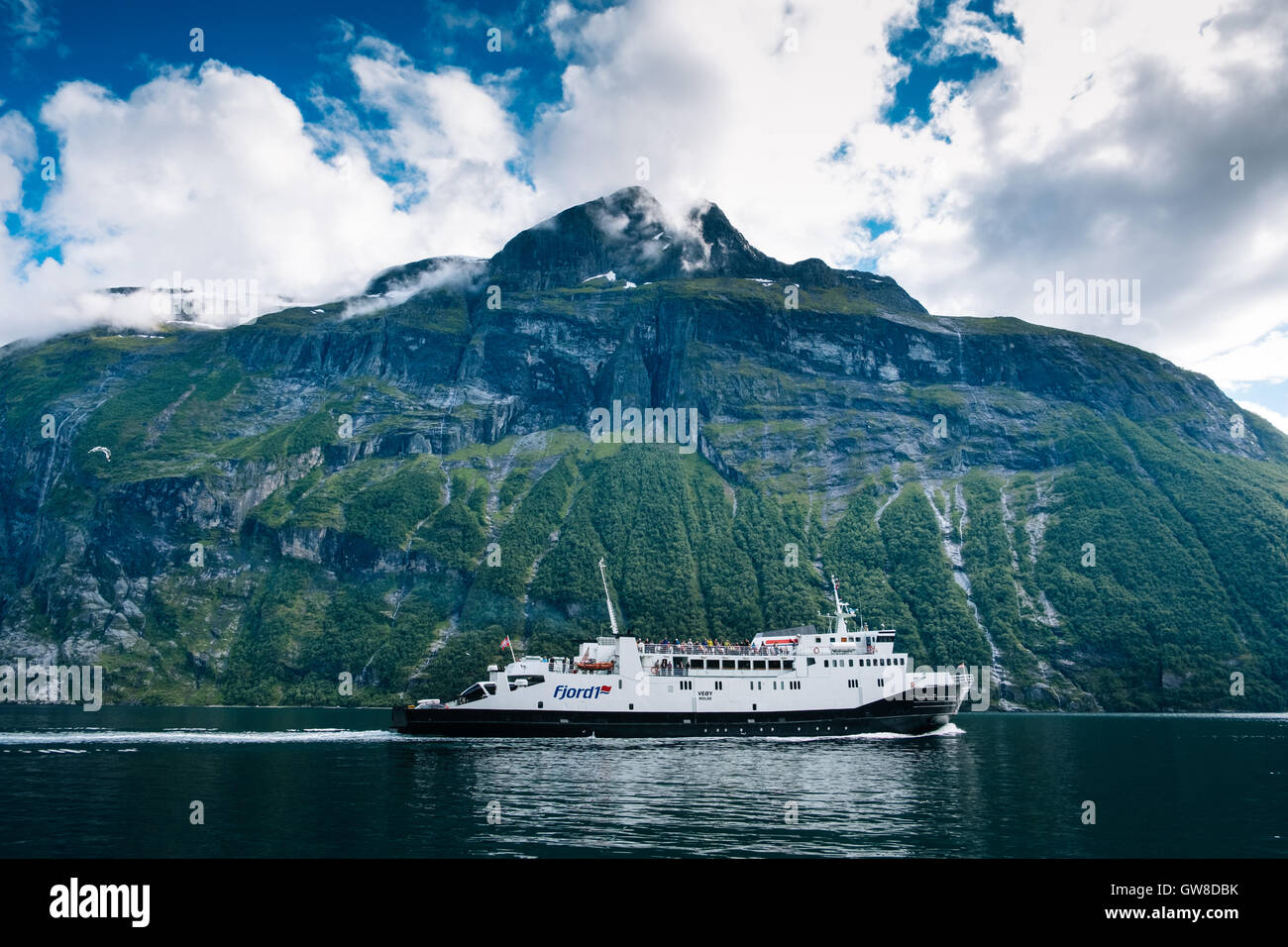 Passenger ferry in Geiranger fjord, Norway Stock Photo - Alamy