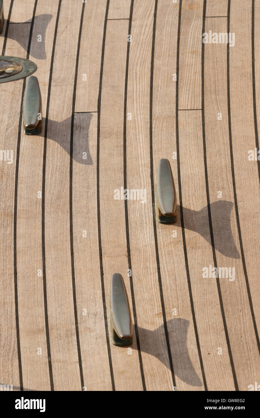 Cleats on the deck of a classic sailing yacht Stock Photo - Alamy