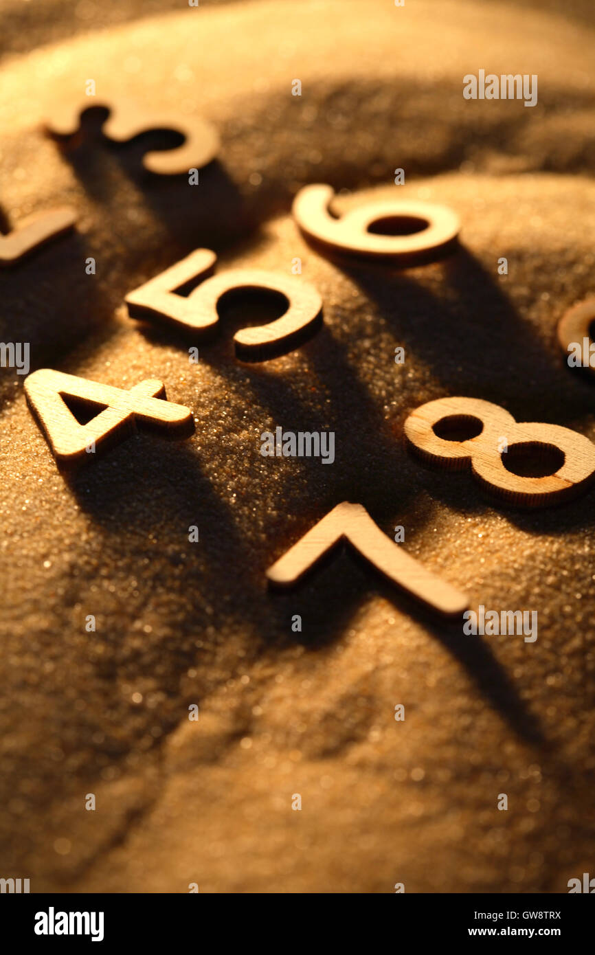 Numbers On Sand Stock Photo - Alamy