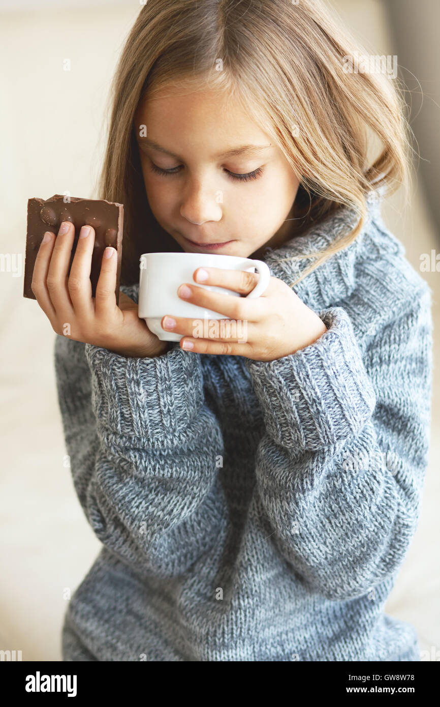 Child drinking tea Stock Photo - Alamy
