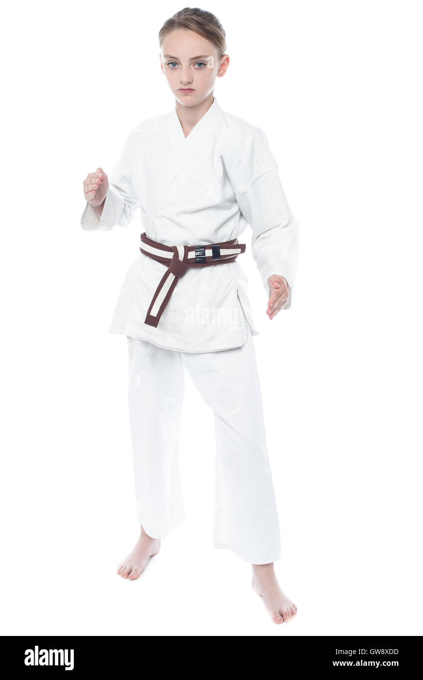 Young girl practicing karate Stock Photo - Alamy