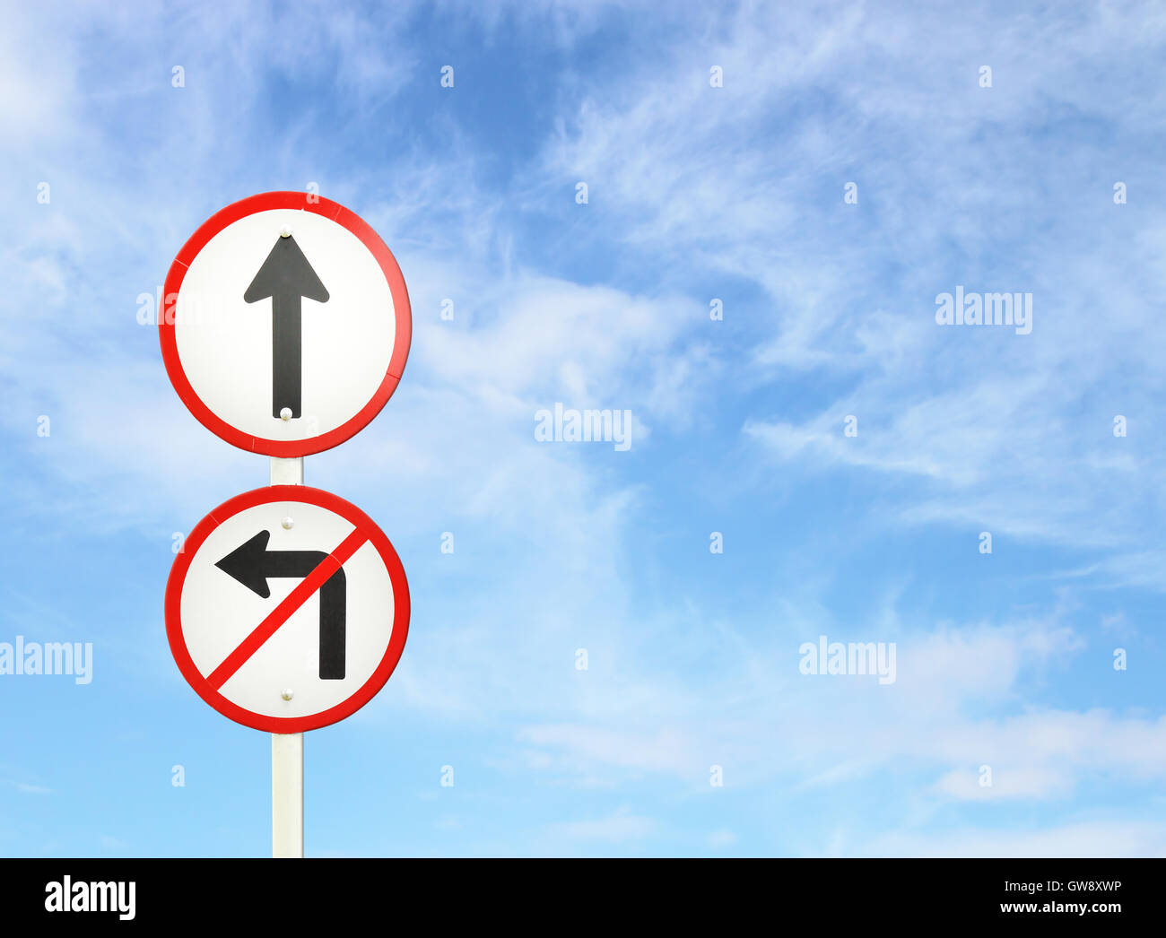 go ahead the way ,forward sign and don't turn left sign Stock Photo - Alamy