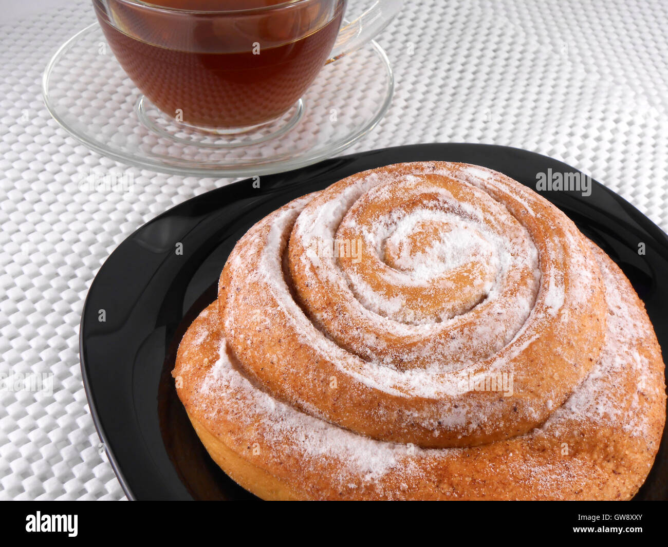 Toasted cakes and tea cup Stock Photo - Alamy