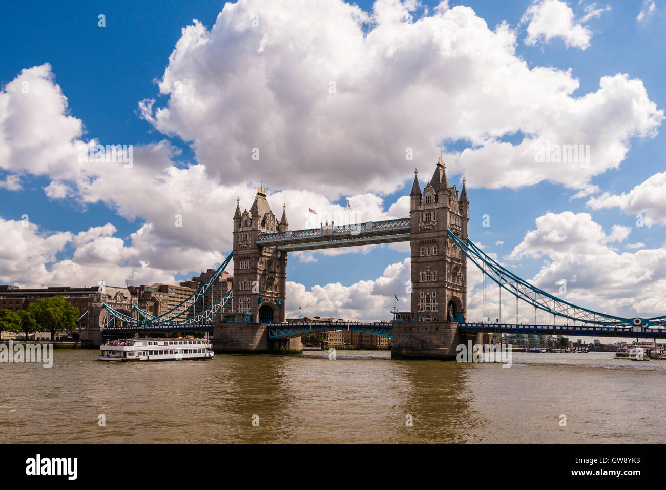 Boat passing under Tower Bridge, London, UK Stock Photo - Alamy