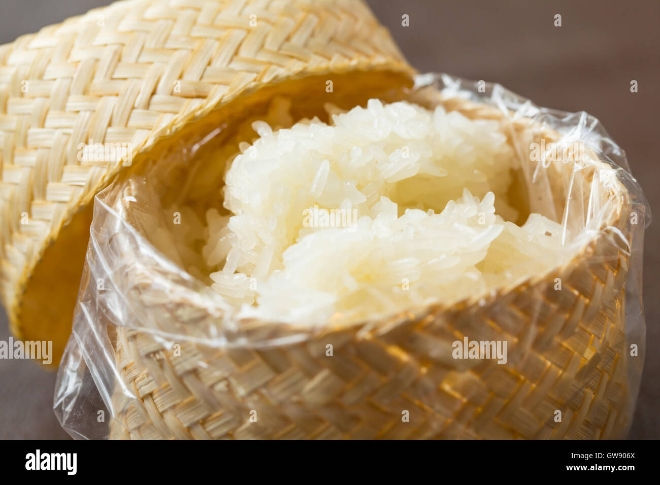 Sticky rice in bamboo container Stock Photo - Alamy