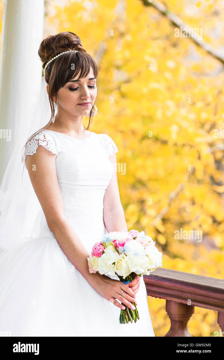 bride in autumn Stock Photo - Alamy
