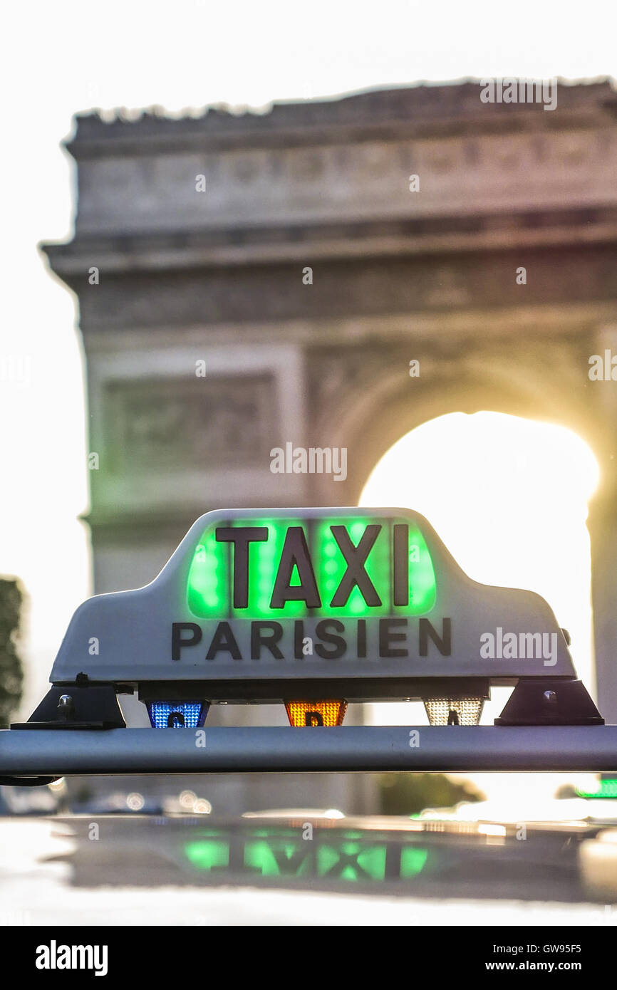 Paris taxi detail and Arc de Triomphe in the background, France Stock ...