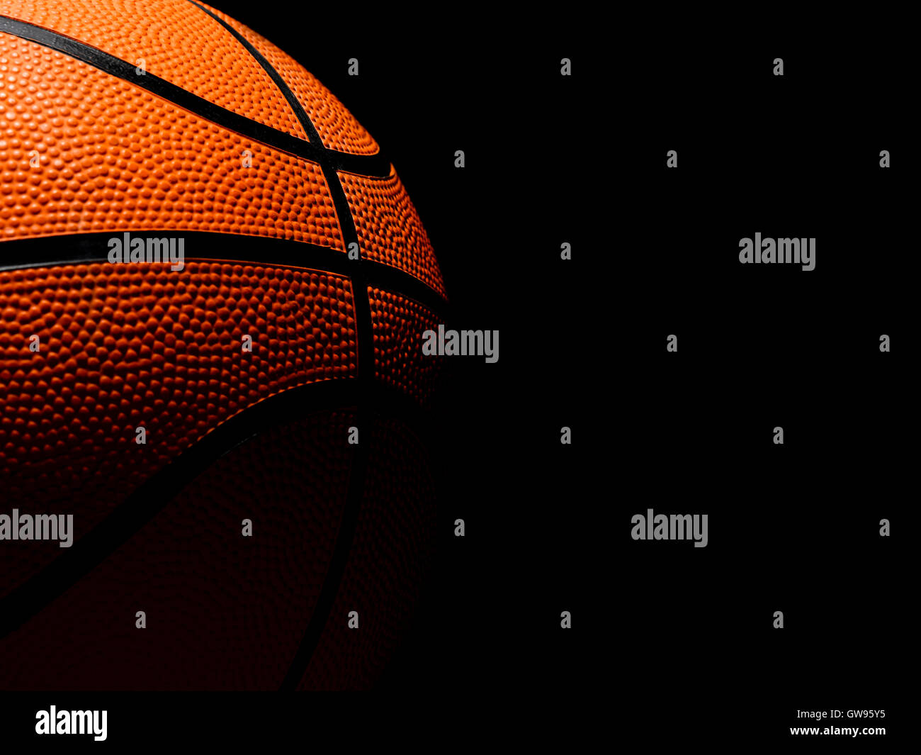 Single Basketball on a black background Stock Photo - Alamy