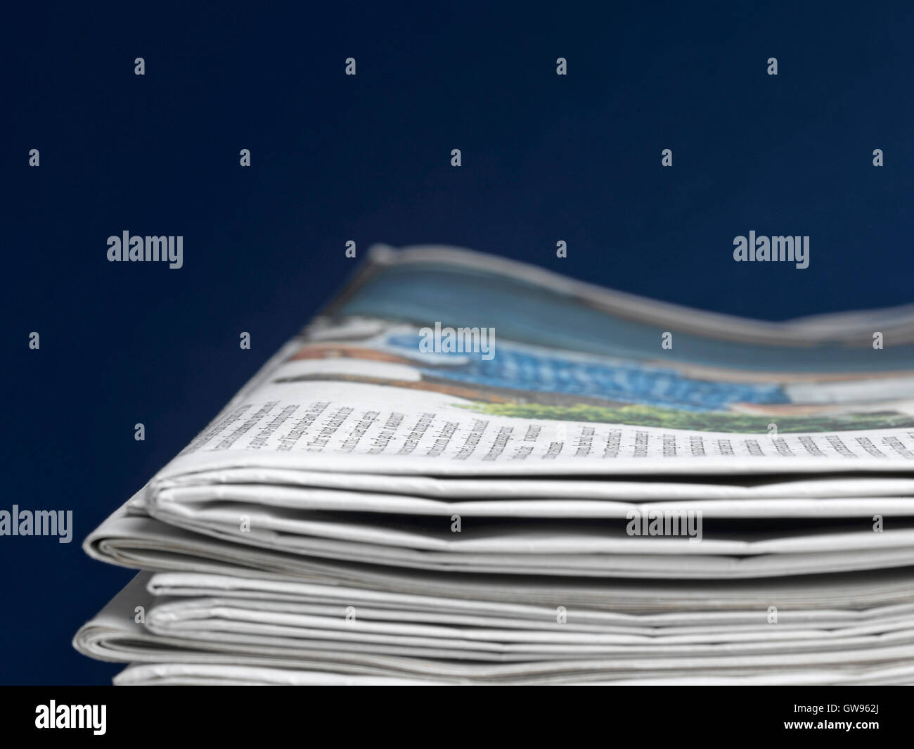 pile of newspaper close up Stock Photo - Alamy