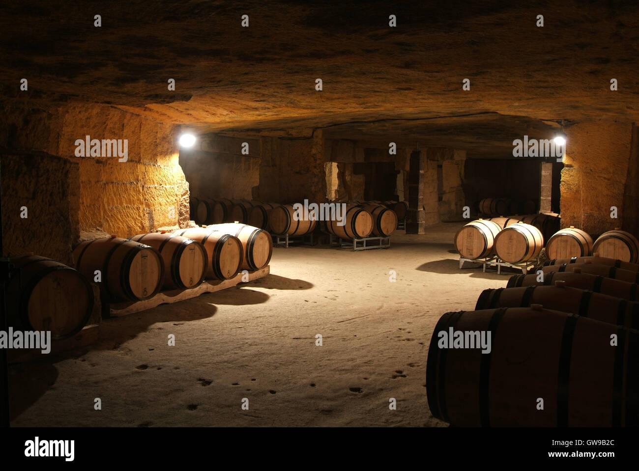 Wine barrels in cellar. Bordeaux Wineyard, France, Europe Stock Photo ...