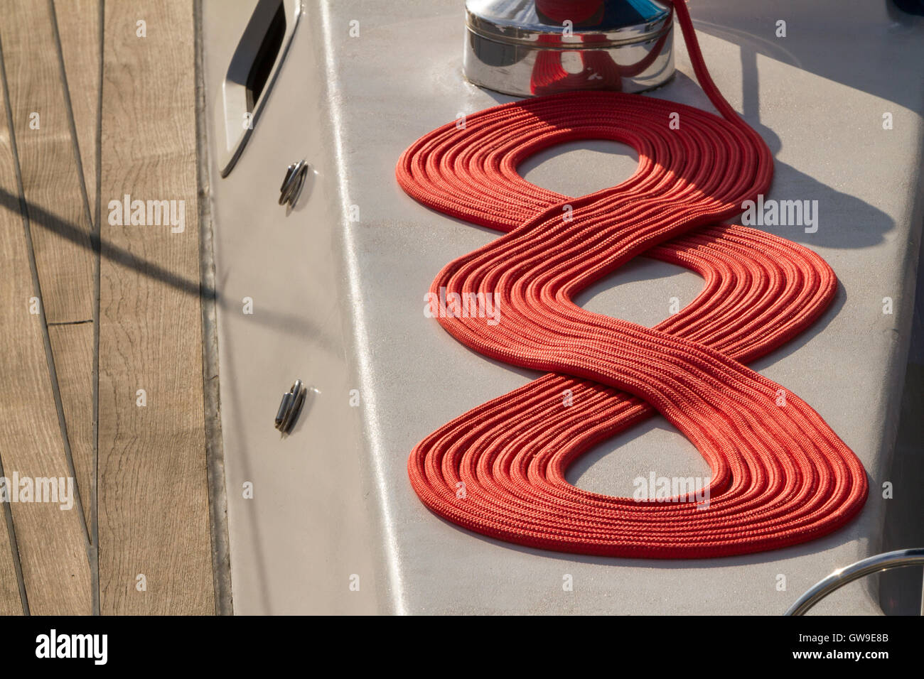 A coiled red line on a sailing yacht Stock Photo - Alamy