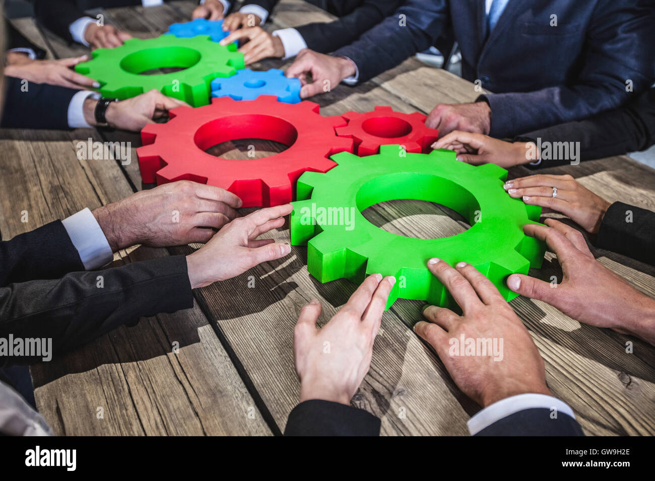 Businessman hand working cog gear hi-res stock photography and images ...