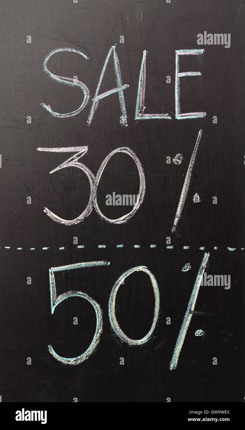 50 discount sign written with chalk Stock Photo - Alamy
