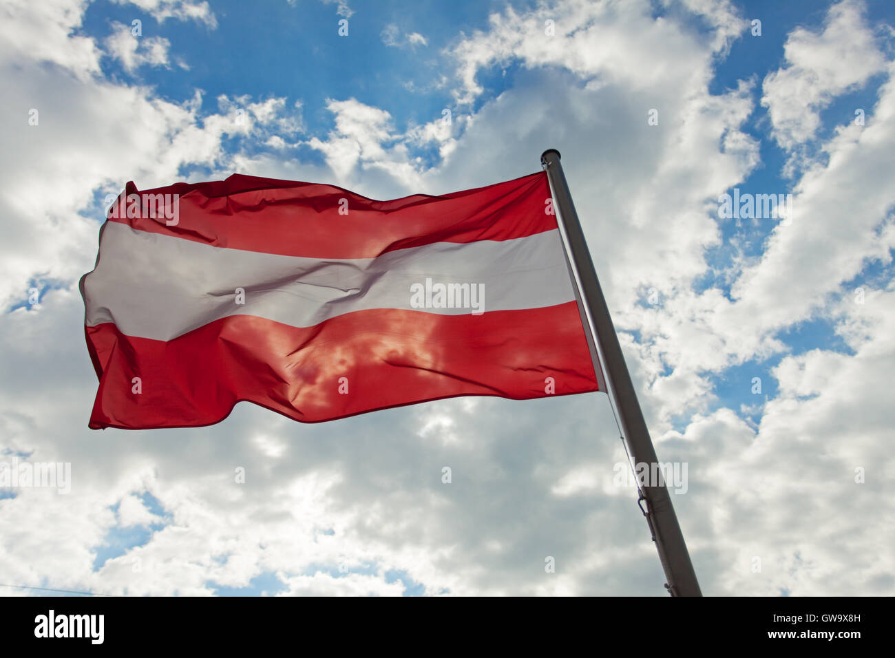 austrian flag in the wind Stock Photo - Alamy