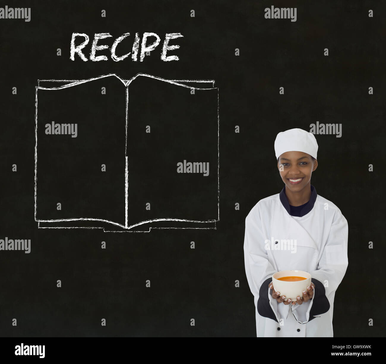 Chef with recipe book on chalk blackboard menu background Stock Photo ...