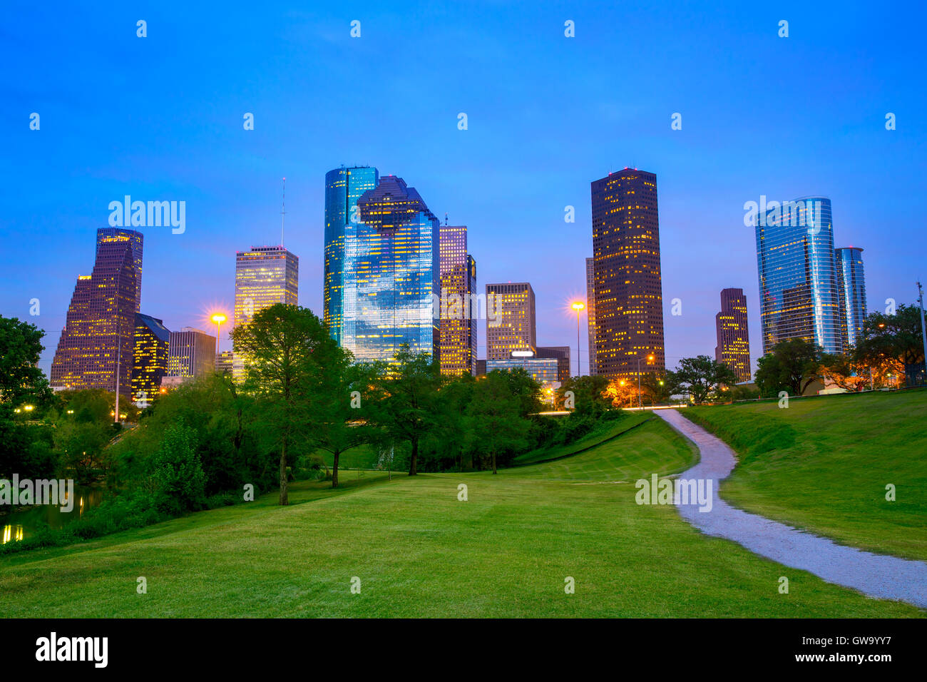 Houston Texas modern skyline at sunset twilight from park Stock Photo ...