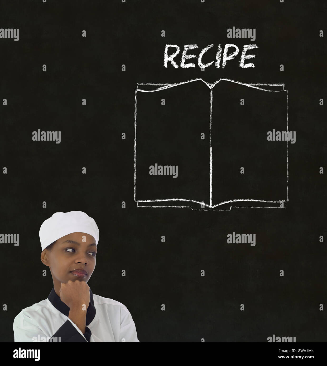 Chef with recipe book on chalk blackboard menu background Stock Photo ...