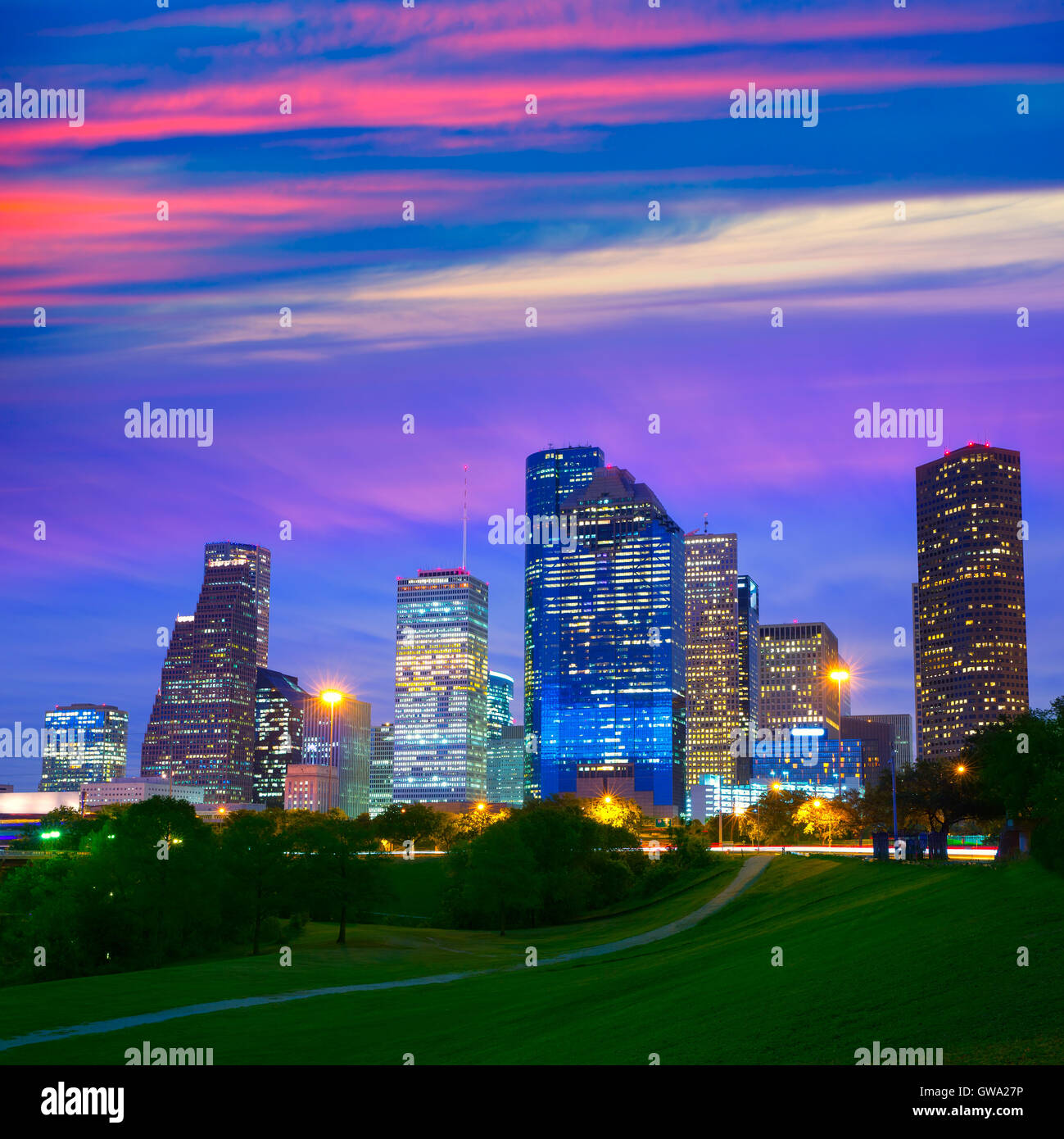 Houston Texas modern skyline at sunset twilight from park Stock Photo ...